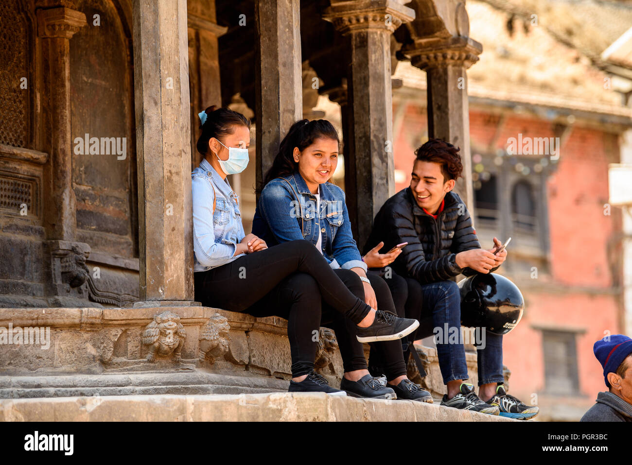 KATMANDU, NEPAL - MAR 6, 2017: Unidentified Chhetri people sit on the ...