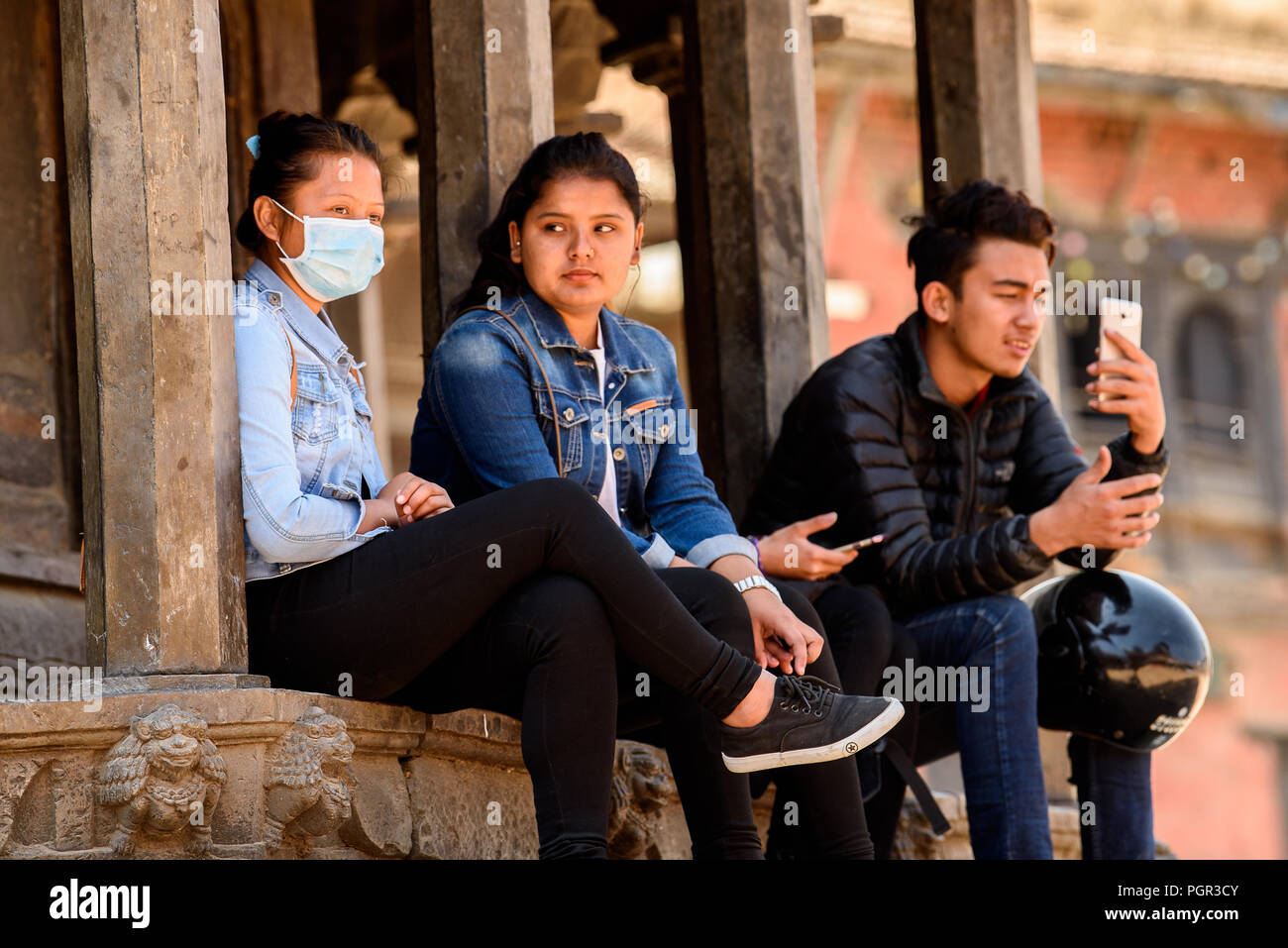 KATMANDU, NEPAL - MAR 6, 2017: Unidentified Chhetri people sit on the ...