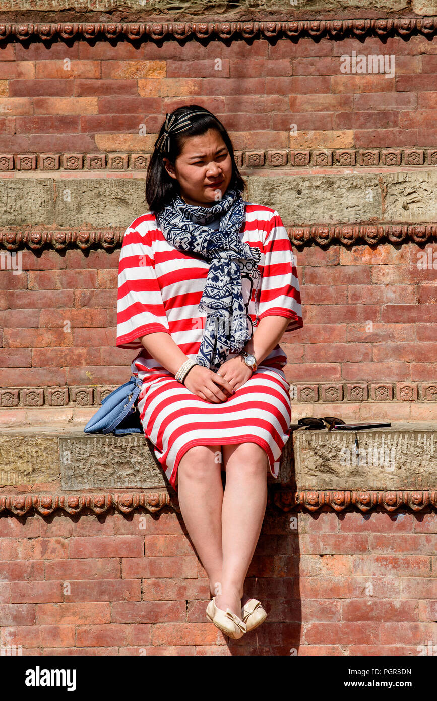 KATMANDU, NEPAL - MAR 6, 2017: Unidentified Chhetri woman in striped ...