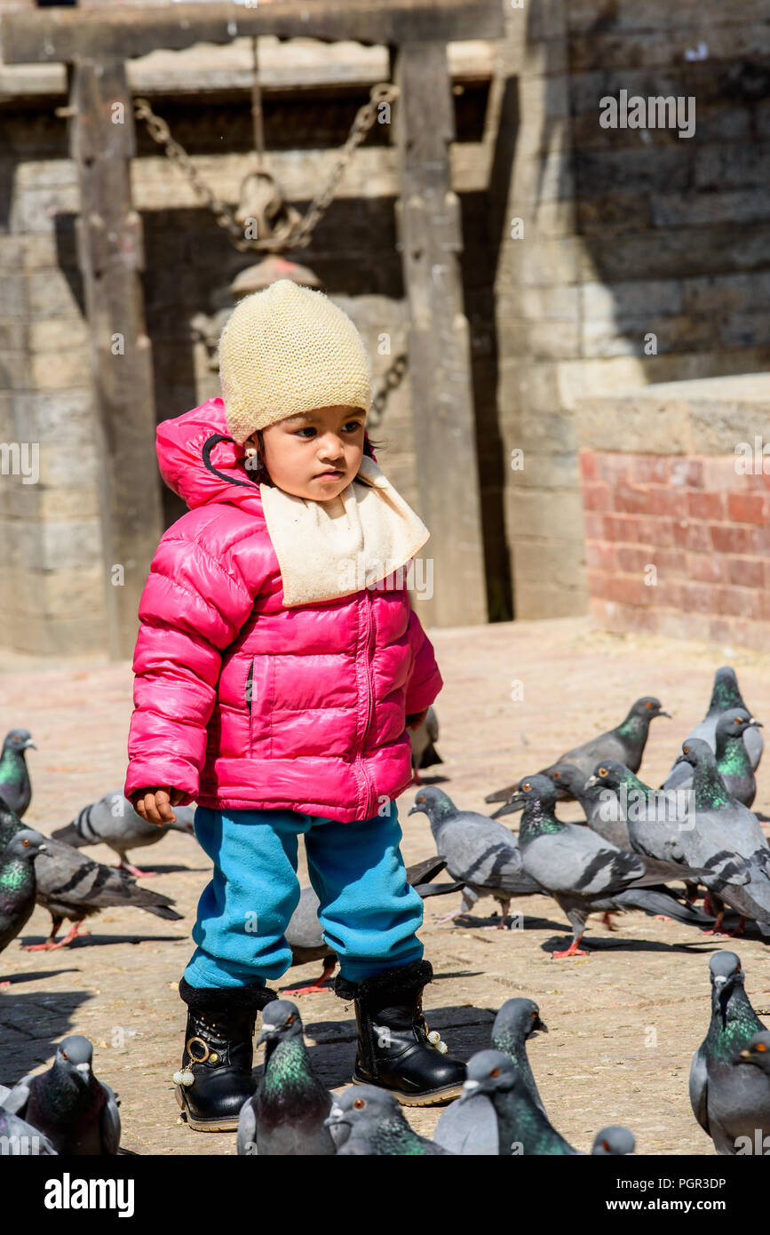 KATMANDU, NEPAL - MAR 6, 2017: Unidentified Chhetri little girl in pink ...