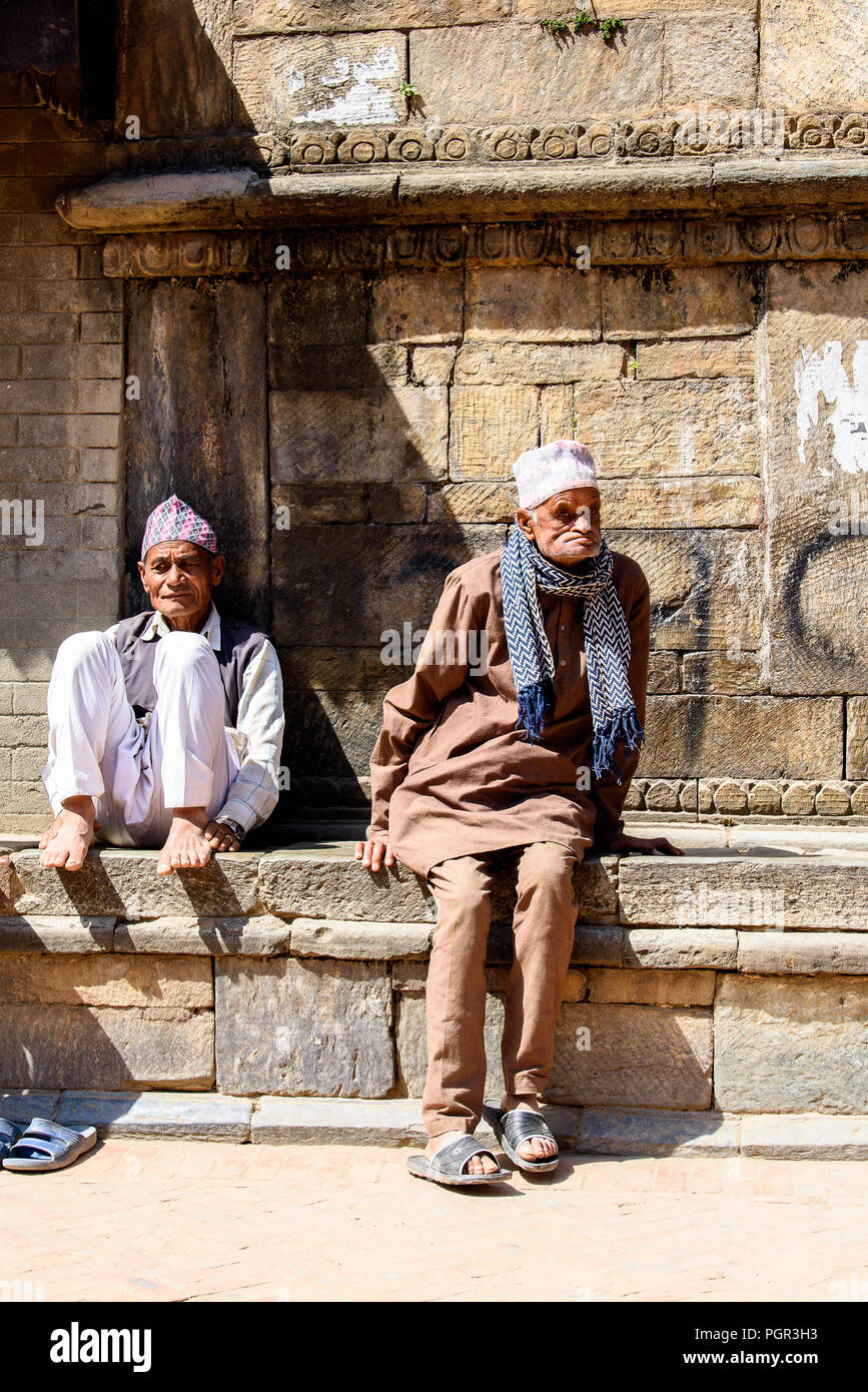 KATMANDU, NEPAL - MAR 6, 2017: Unidentified Chhetri people sit on the ...