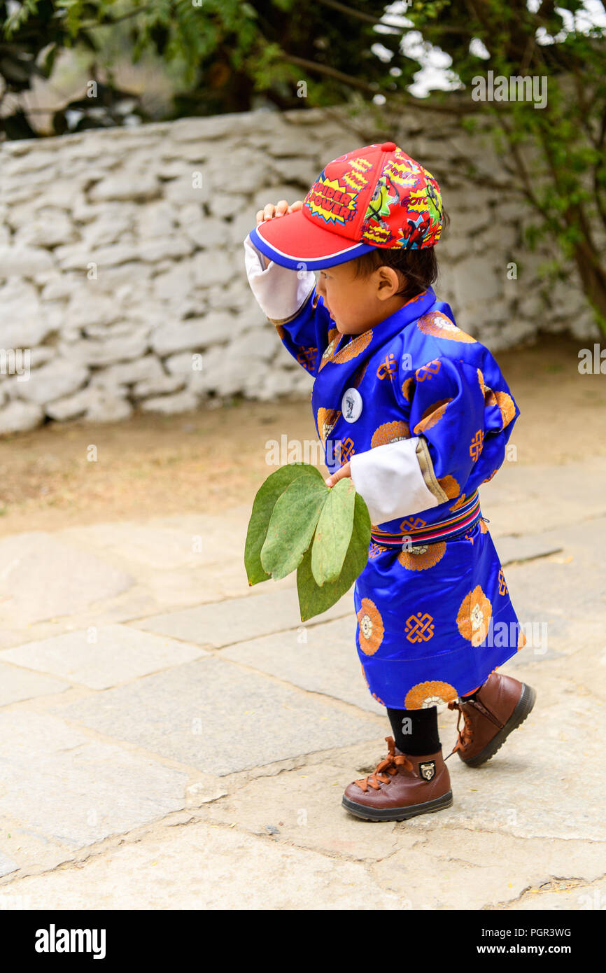 TRIMPHU, BHUTAN - MAR 8, 2017: Unidentified Ngalops little boy in a cap ...