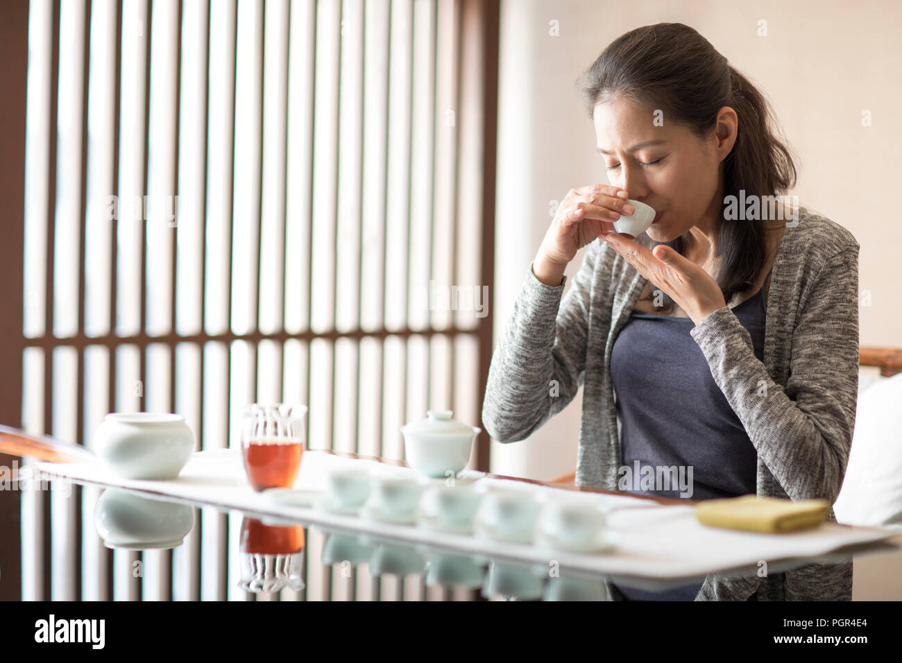 Mature woman tea tasting hi-res stock photography and images - Alamy