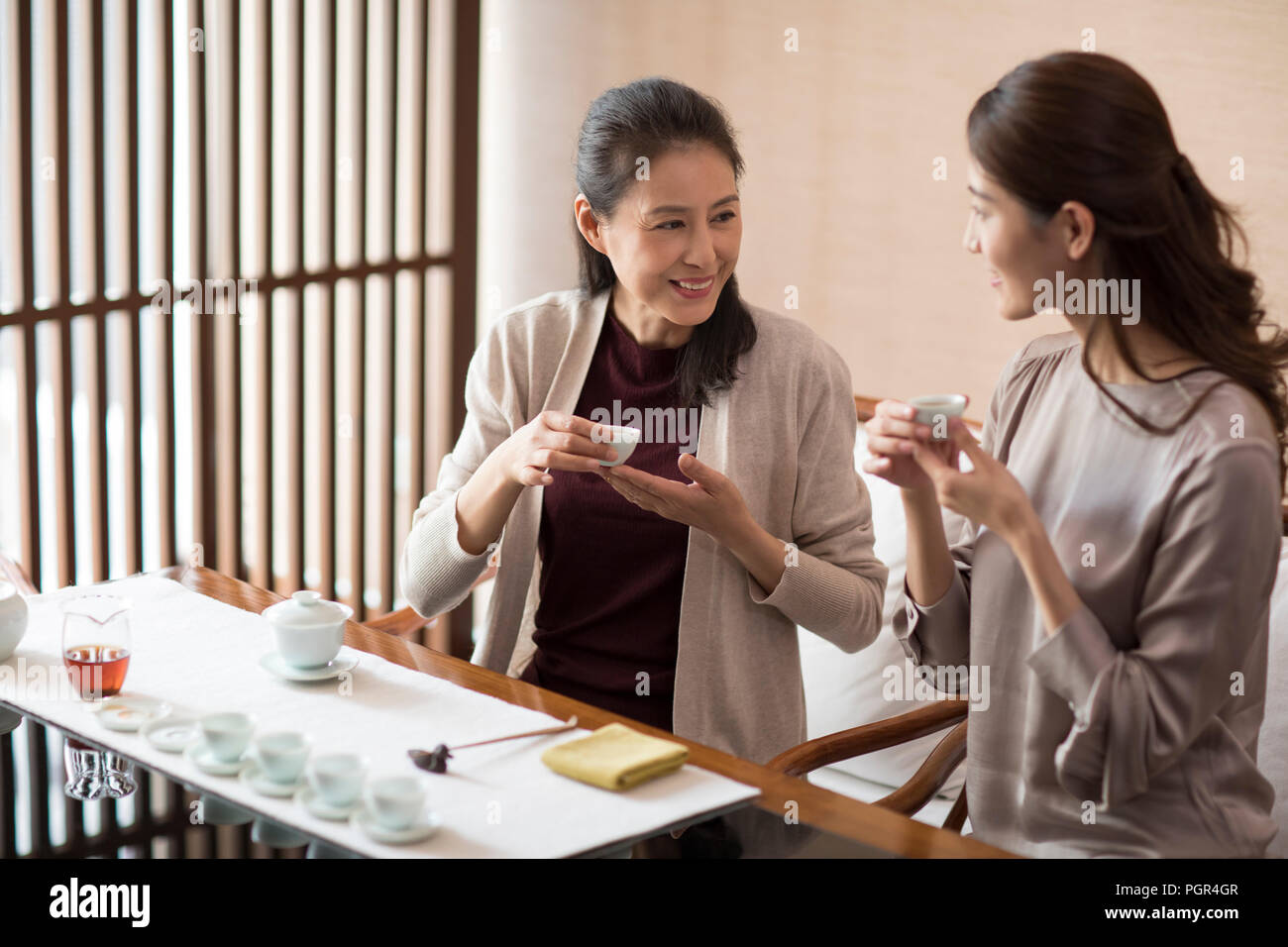 Two old women talking tea hi-res stock photography and images - Alamy