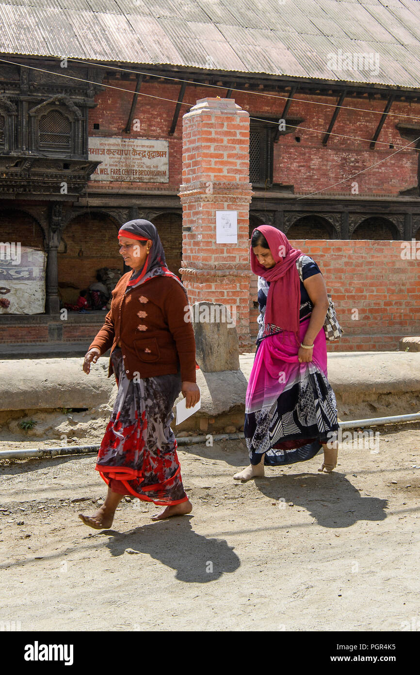 KATMANDU, NEPAL - MAR 6, 2017: Unidentified Chhetri people walk along ...