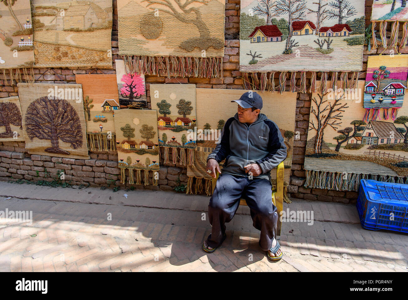 KATMANDU, NEPAL - MAR 6, 2017: Unidentified Chhetri man sits in a chair ...