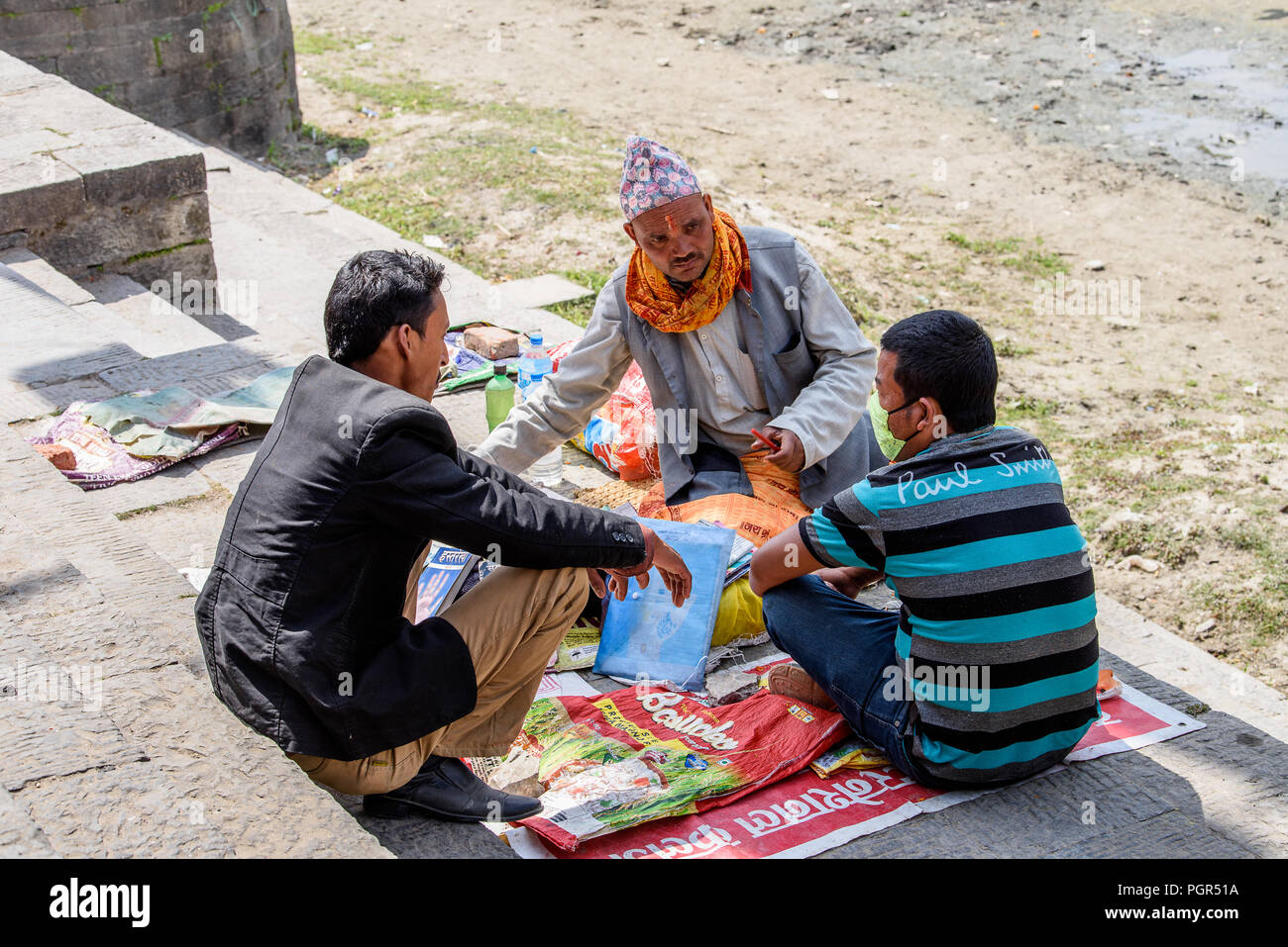 KATMANDU, NEPAL - MAR 6, 2017: Unidentified Chhetri people sit on the ...
