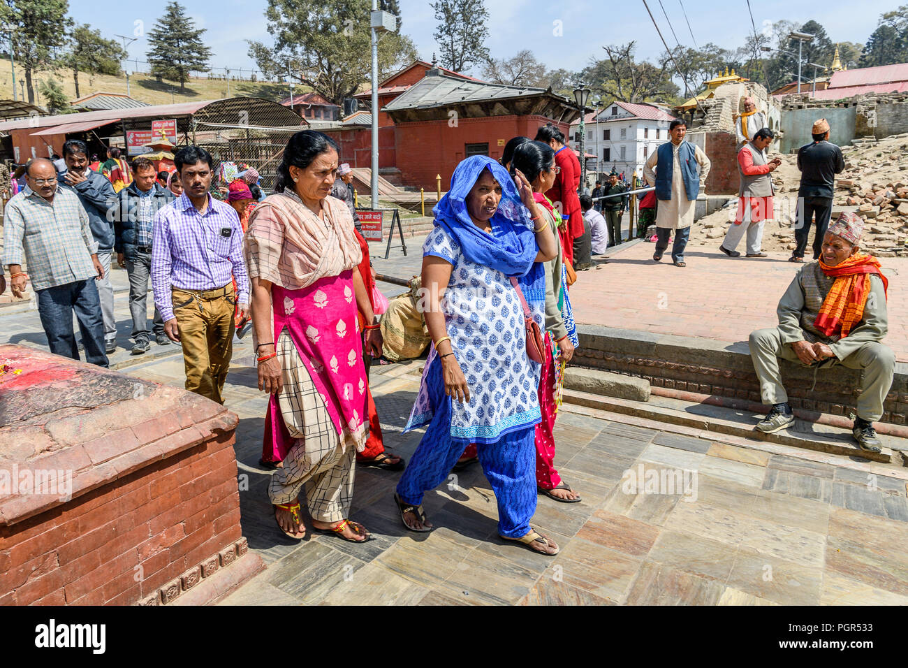 KATMANDU, NEPAL - MAR 6, 2017: Unidentified Chhetri people walk along ...