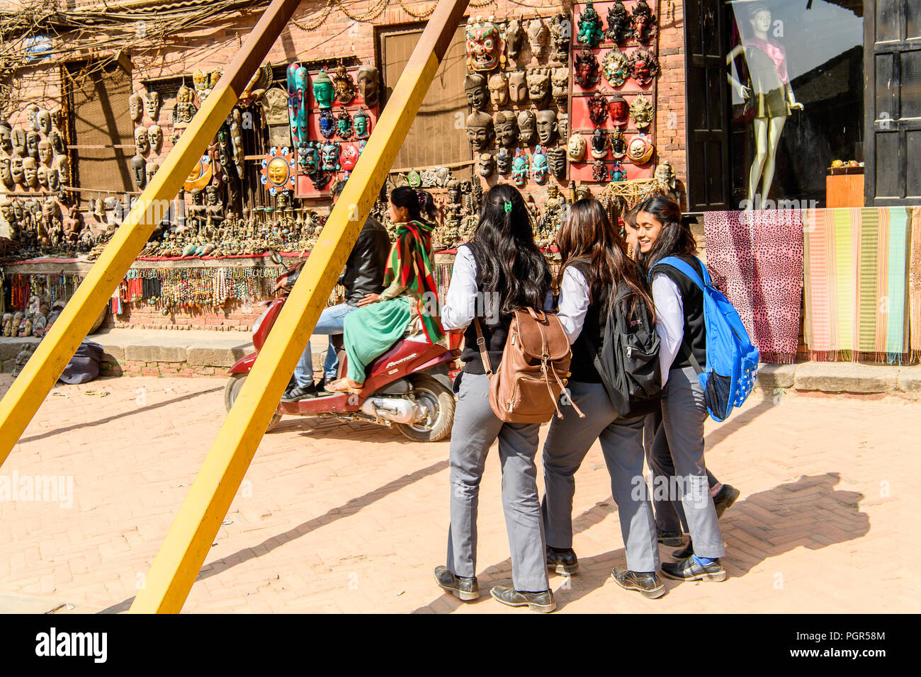 KATMANDU, NEPAL - MAR 6, 2017: Unidentified Chhetri girls walk along ...