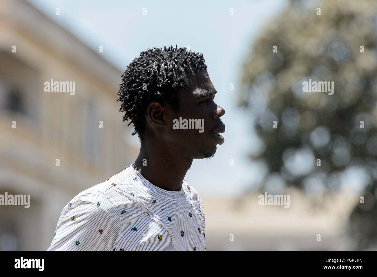 SAINT LOUIS, SENEGAL - APR 24, 2017: Unidentified Senegalese man with ...