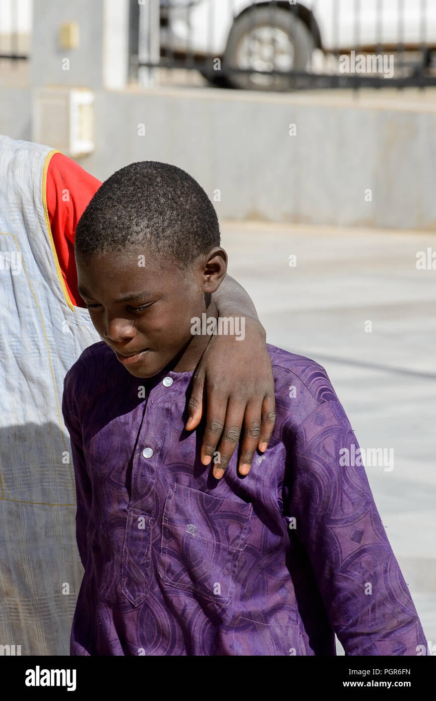 TOUBA, SENEGAL - APR 26, 2017: Unidentified Senegalese boy in violet ...