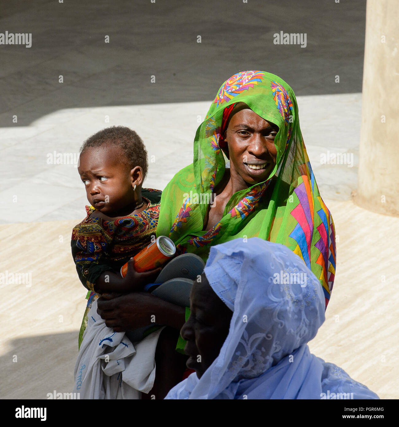 TOUBA, SENEGAL - APR 26, 2017: Unidentified Senegalese woman in colored ...