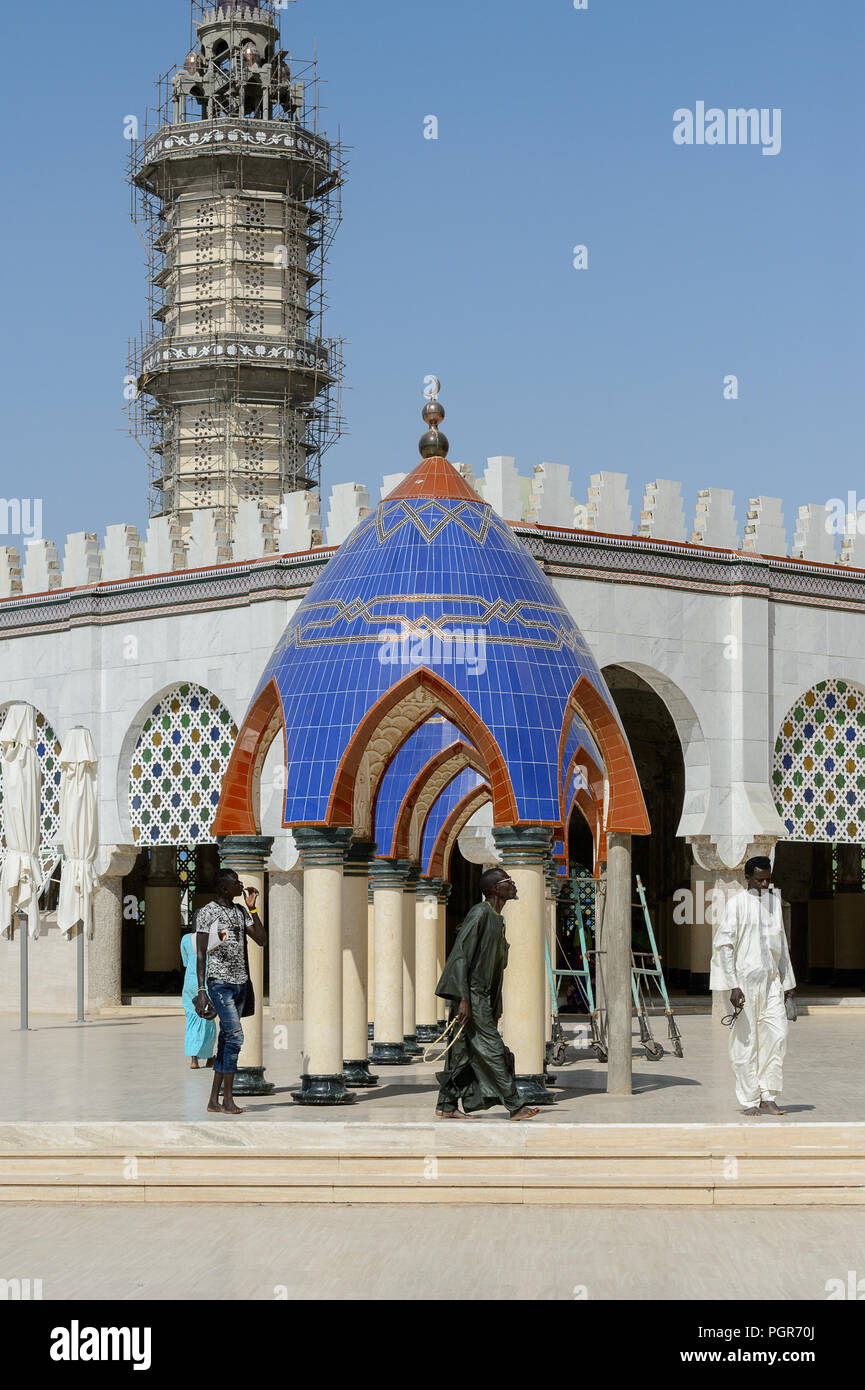 TOUBA, SENEGAL - APR 26, 2017: Unidentified Senegalese people in long ...