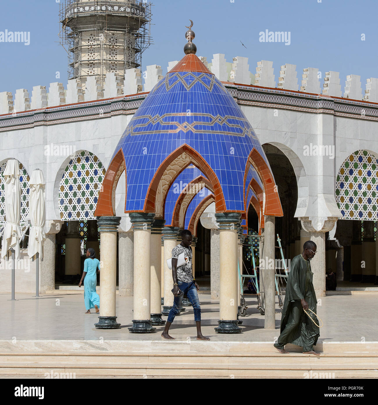 TOUBA, SENEGAL - APR 26, 2017: Unidentified Senegalese people in long ...