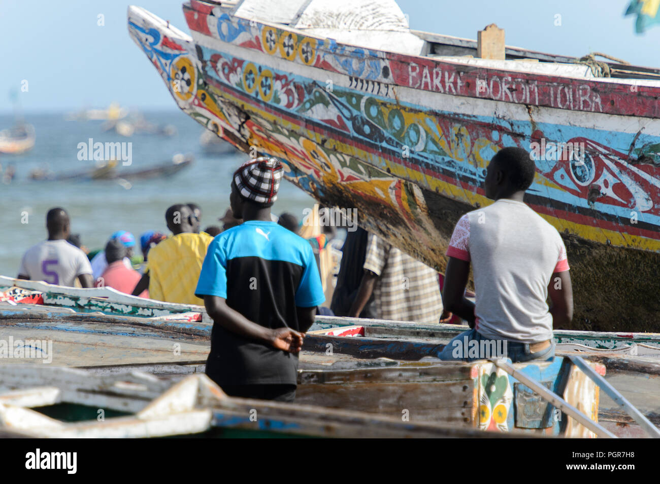 KAYAR, SENEGAL - APR 27, 2017: Unidentified Senegalese people stand ...
