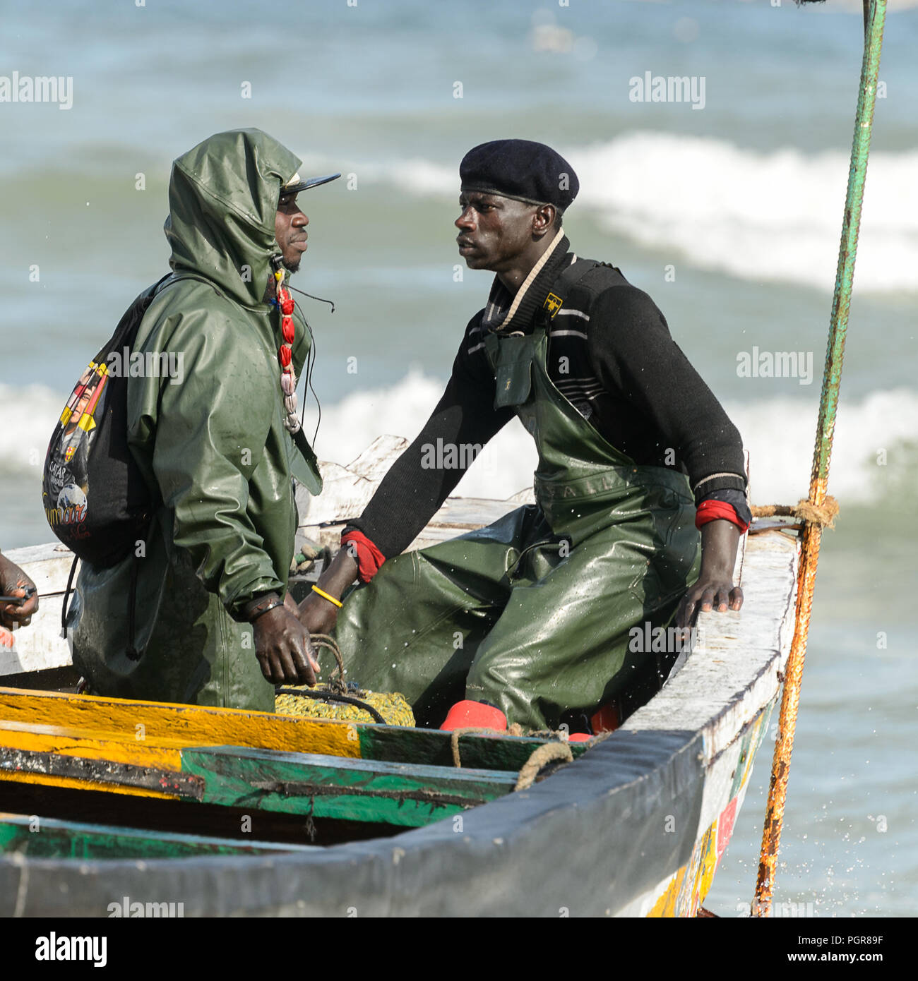 KAYAR, SENEGAL - APR 27, 2017: Unidentified Senegalese people sail on ...