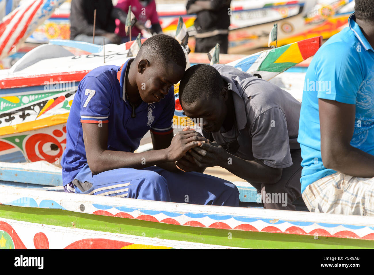 KAYAR, SENEGAL - APR 27, 2017: Unidentified Senegalese boys stare at ...