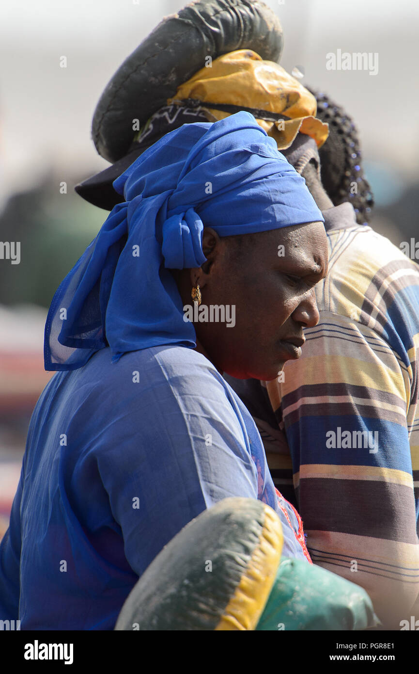 KAYAR, SENEGAL - APR 27, 2017: Unidentified Senegalese woman in blue ...