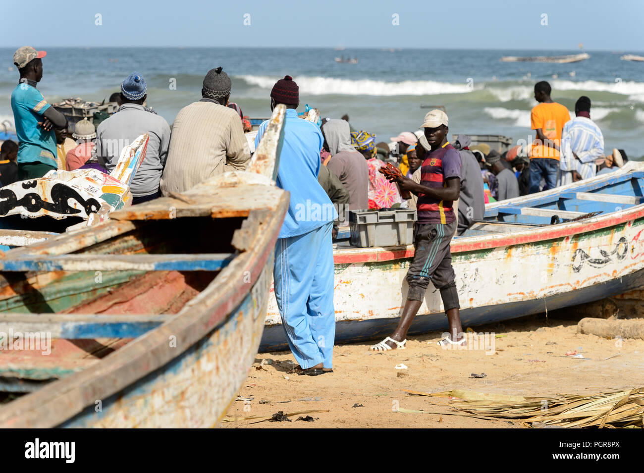 KAYAR, SENEGAL - APR 27, 2017: Unidentified Senegalese man walks near ...