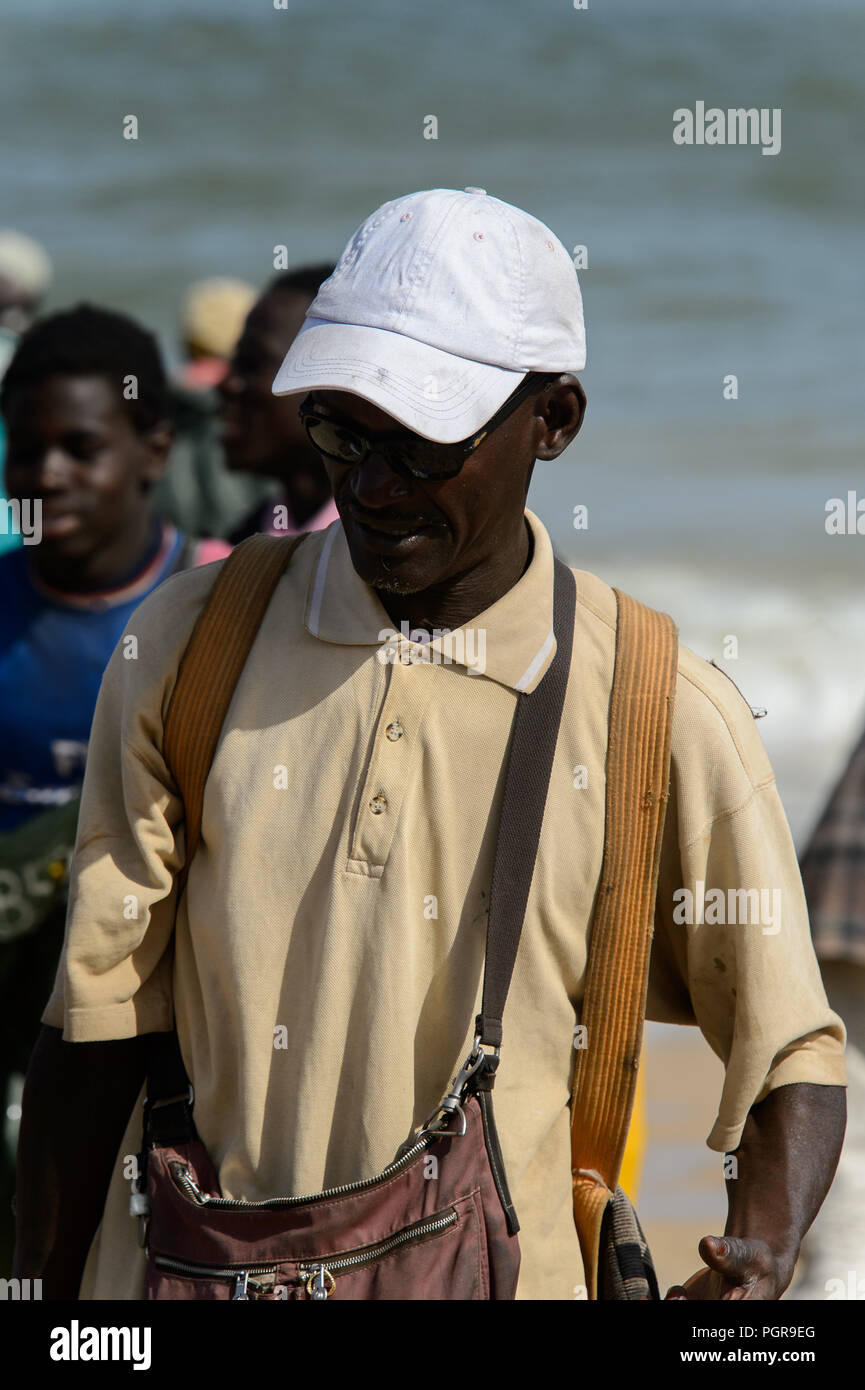 KAYAR, SENEGAL - APR 27, 2017: Unidentified Senegalese man walks on the ...