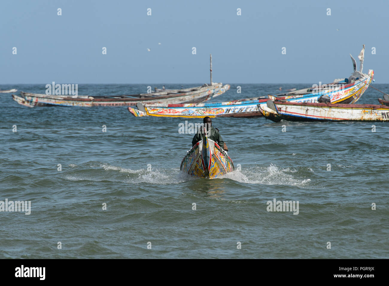KAYAR, SENEGAL - APR 27, 2017: Unidentified Senegalese people sail on ...
