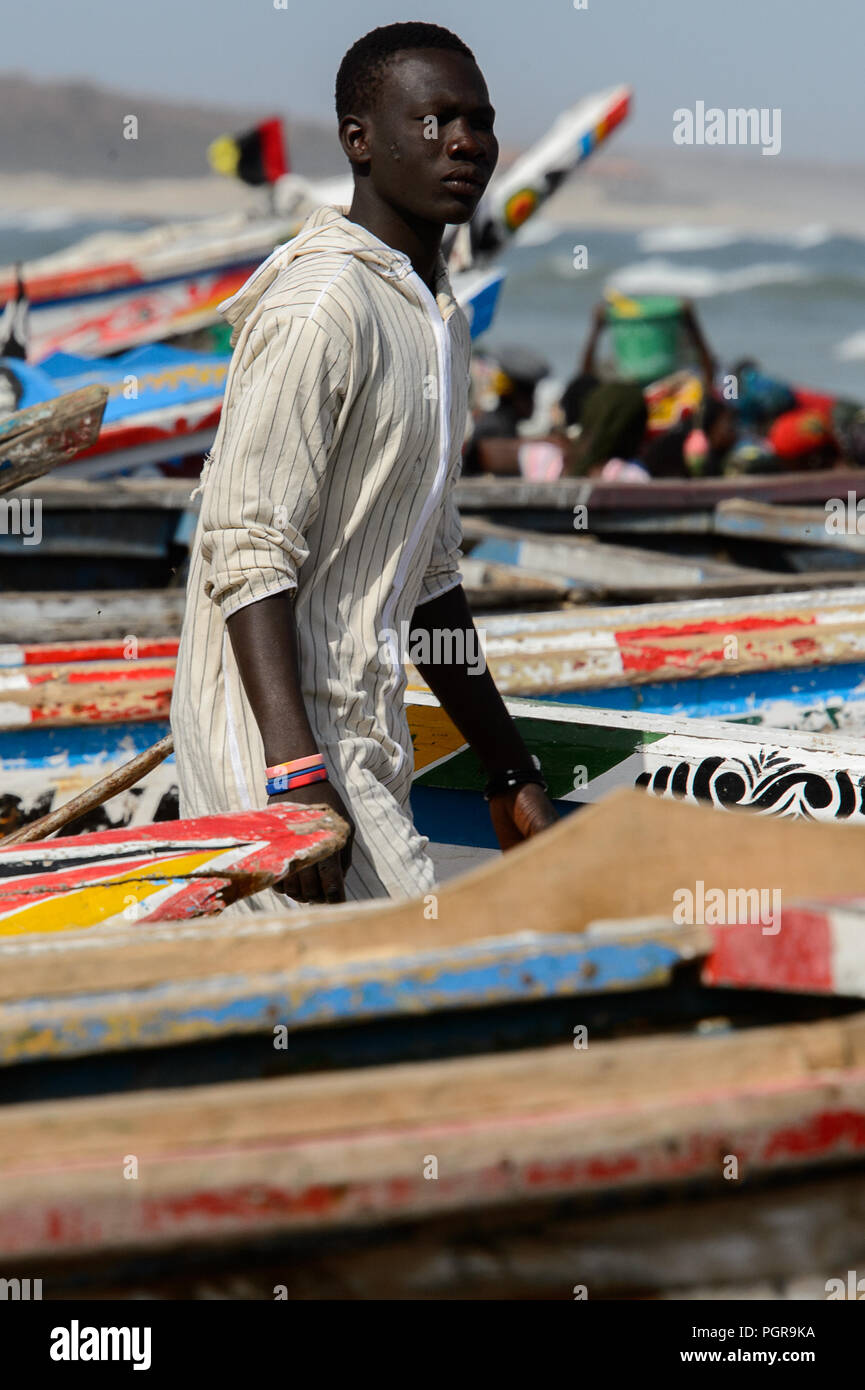 KAYAR, SENEGAL - APR 27, 2017: Unidentified Senegalese man stands near ...