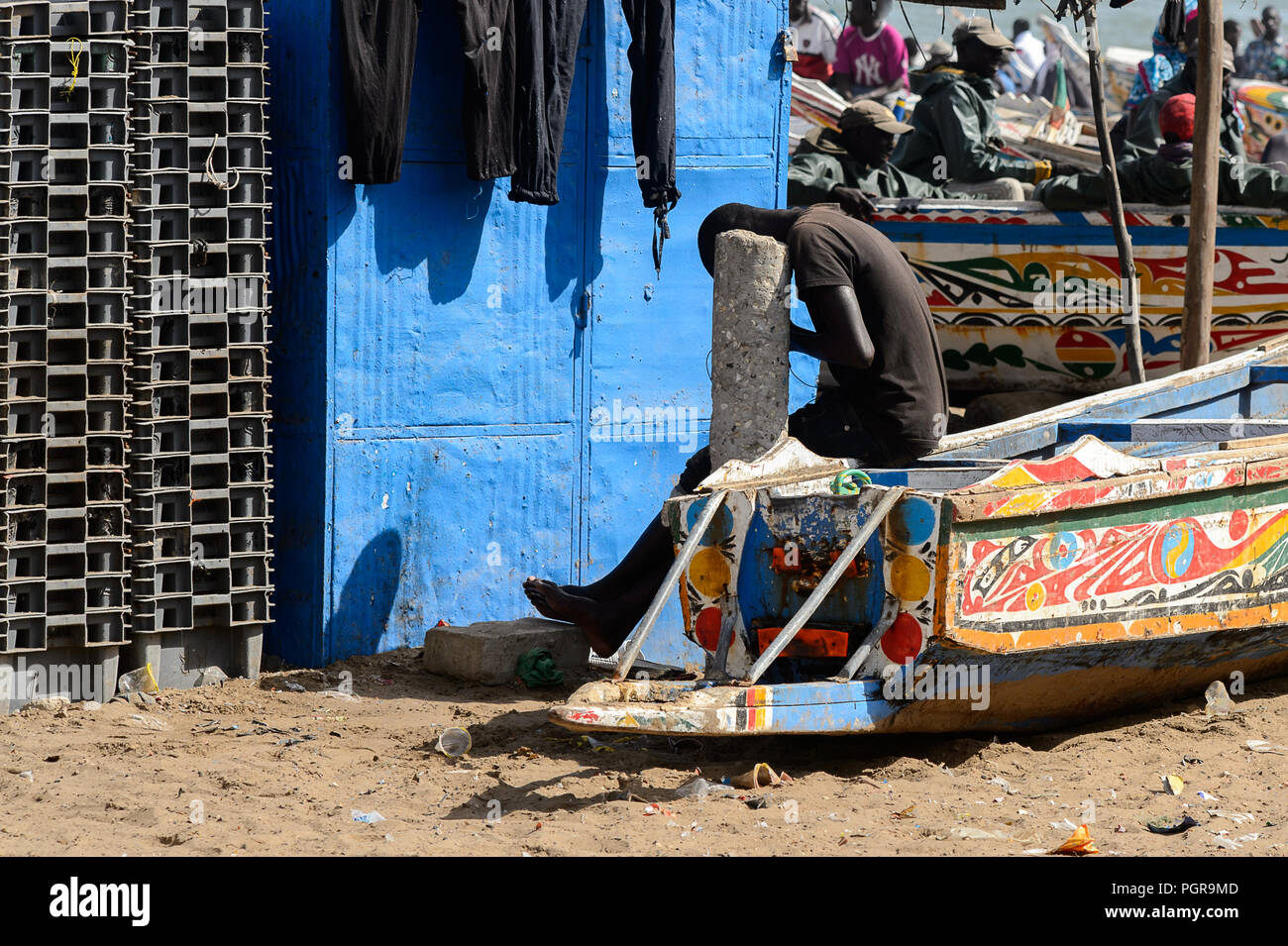 KAYAR, SENEGAL - APR 27, 2017: Unidentified Senegalese man sits on the ...