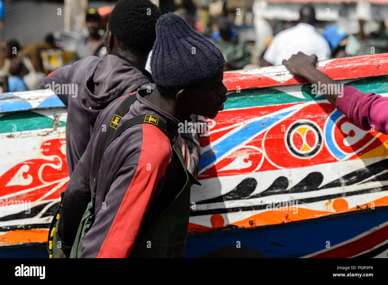 KAYAR, SENEGAL - APR 27, 2017: Unidentified Senegalese people pull the ...