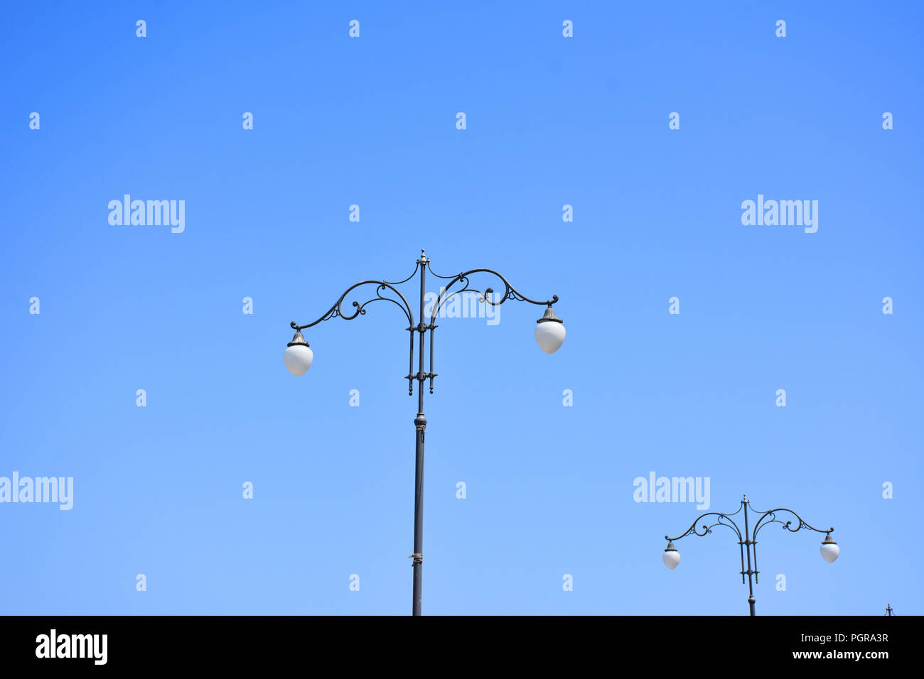 Italy, Puglia region, Taranto, street lamps for street lighting in the ...