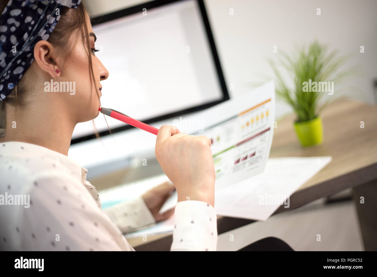 Female graphic designer using pc computer at the office Stock Photo - Alamy