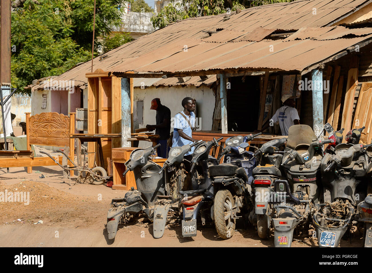 ZIGUINCHOR, SENEGAL - APR 28, 2017: Unidentified Senegalese man walks ...