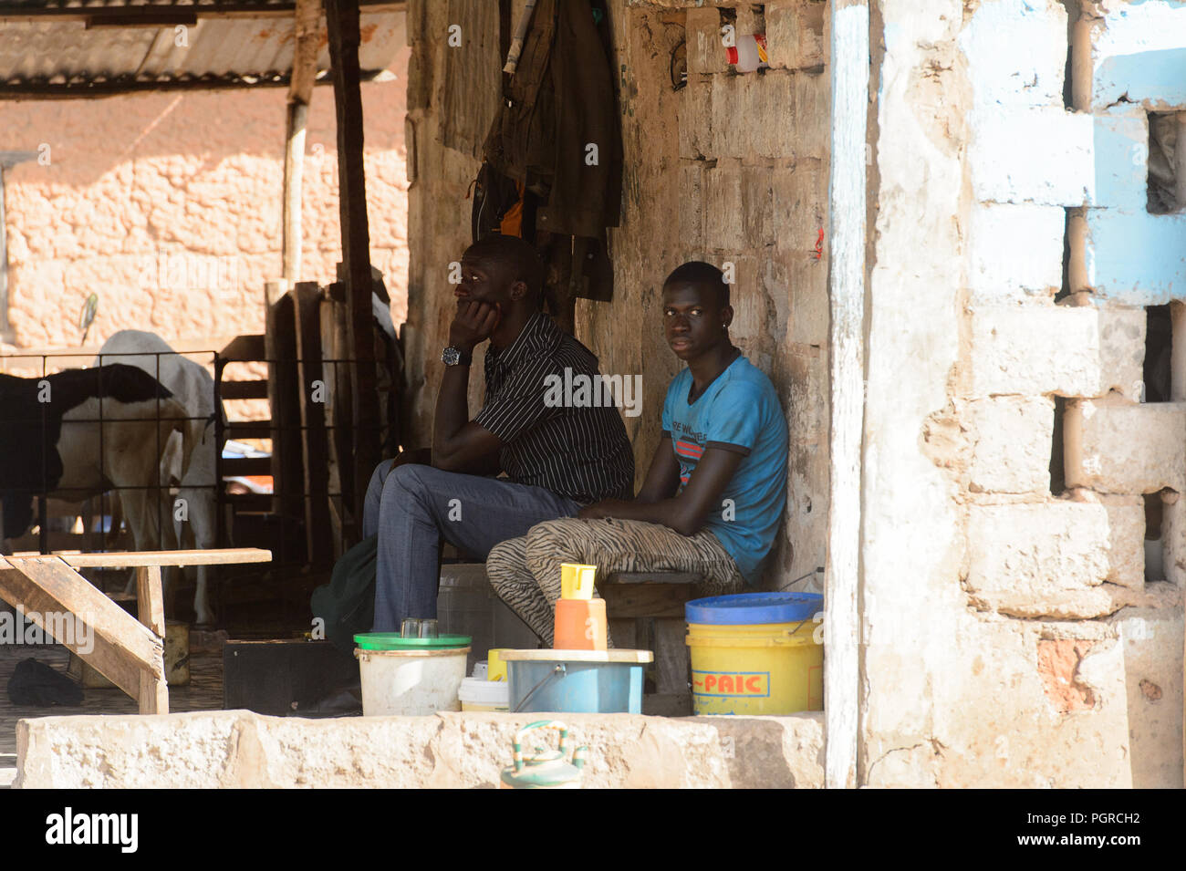 ZIGUINCHOR, SENEGAL - APR 28, 2017: Unidentified Senegalese people rest ...