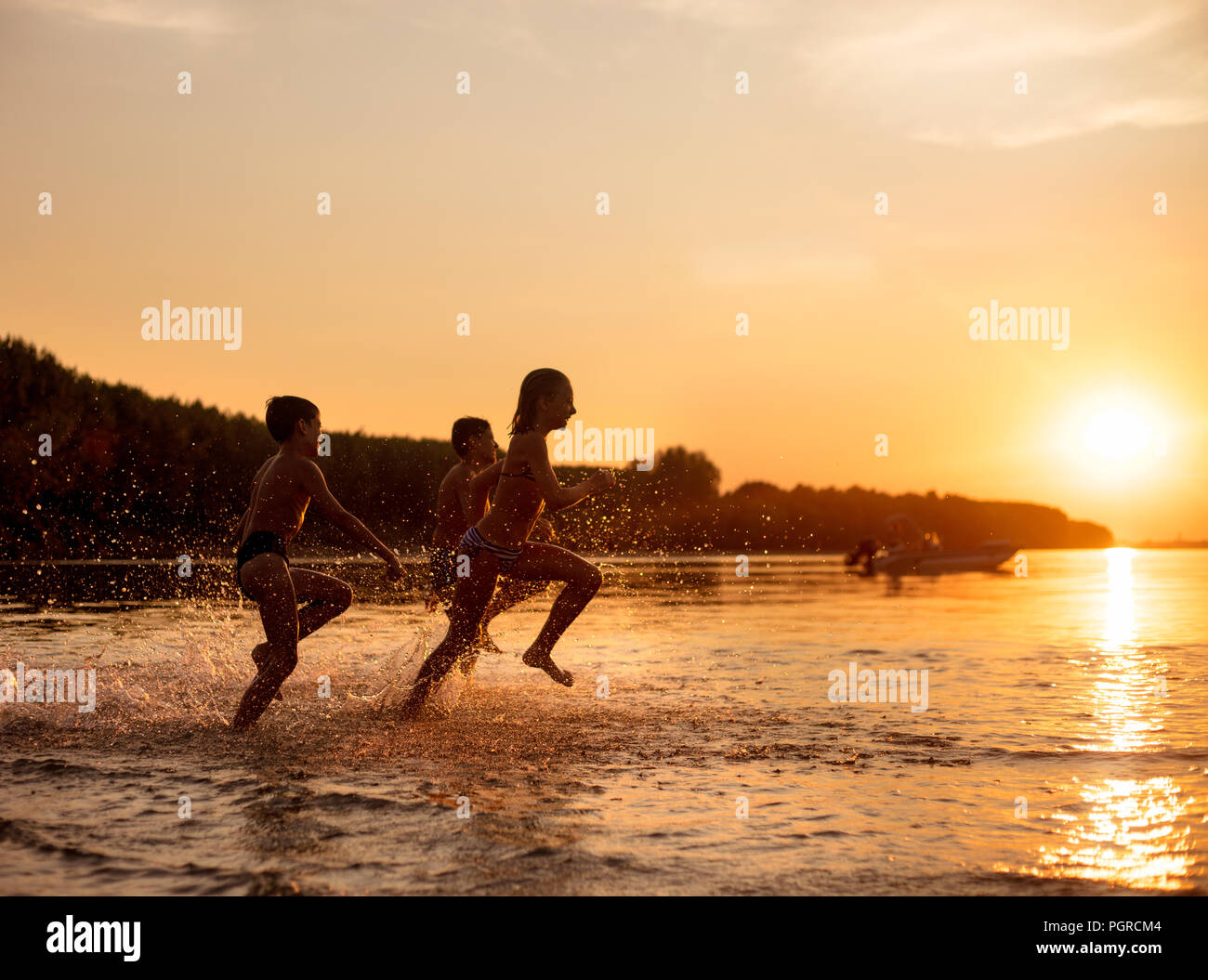Three kids having fun hi-res stock photography and images - Alamy