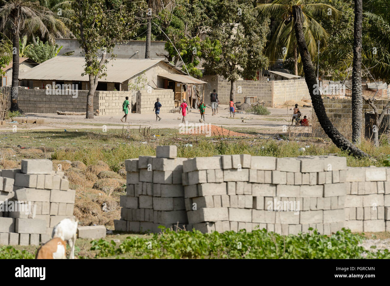 ZIGUINCHOR, SENEGAL - APR 28, 2017: Unidentified Senegalese people walk ...