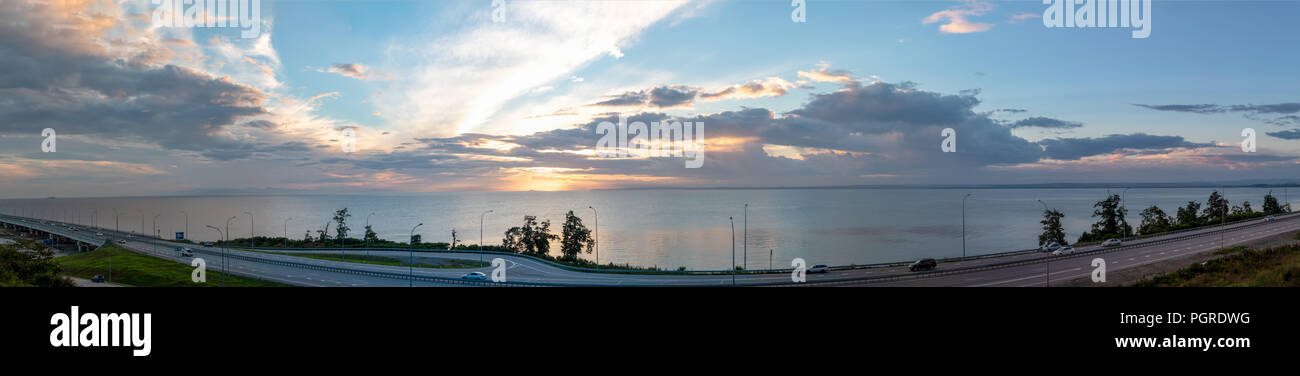 Panorama sky background with clouds during sunset, and the line of ...