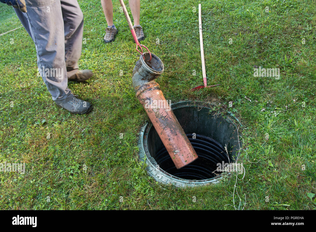 Cleaning and unblocking septic system and draining pipes Stock Photo ...