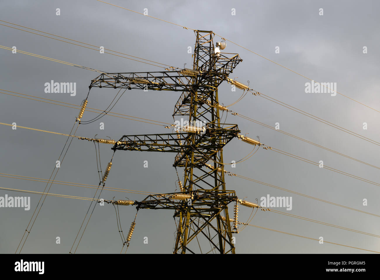 Electric pylons at dusk in England Stock Photo - Alamy