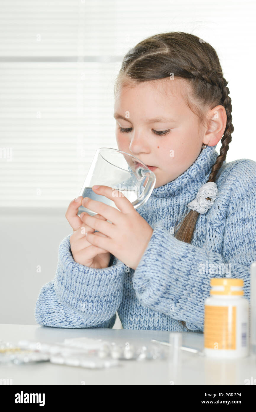 Sick child drinking hi-res stock photography and images - Alamy