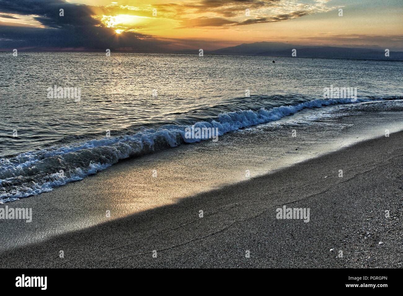Sunset on the beach in Cabo de Gata, Almeria, Spain Stock Photo - Alamy