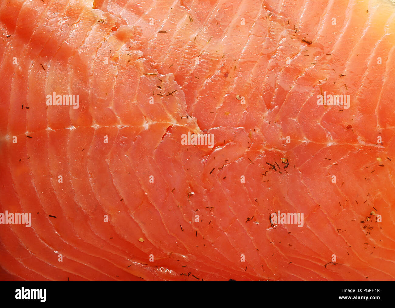 raw salmon fish fillets background Stock Photo - Alamy