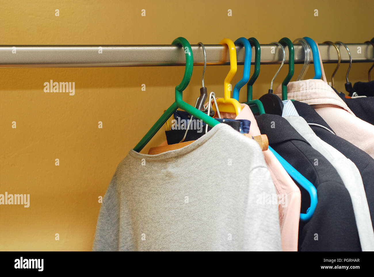 clothes on hangers in the closet Stock Photo - Alamy