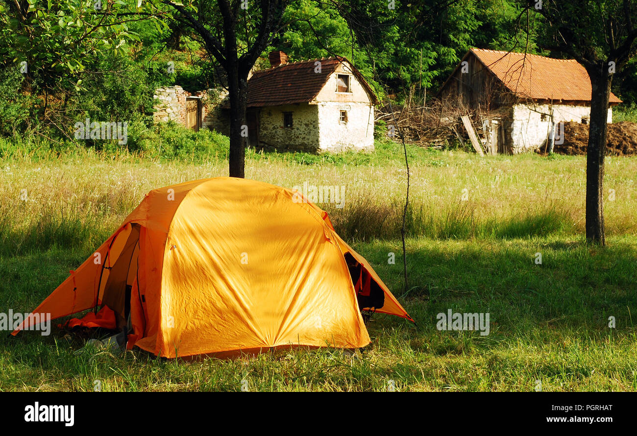 modern tent, old houses in the background Stock Photo - Alamy