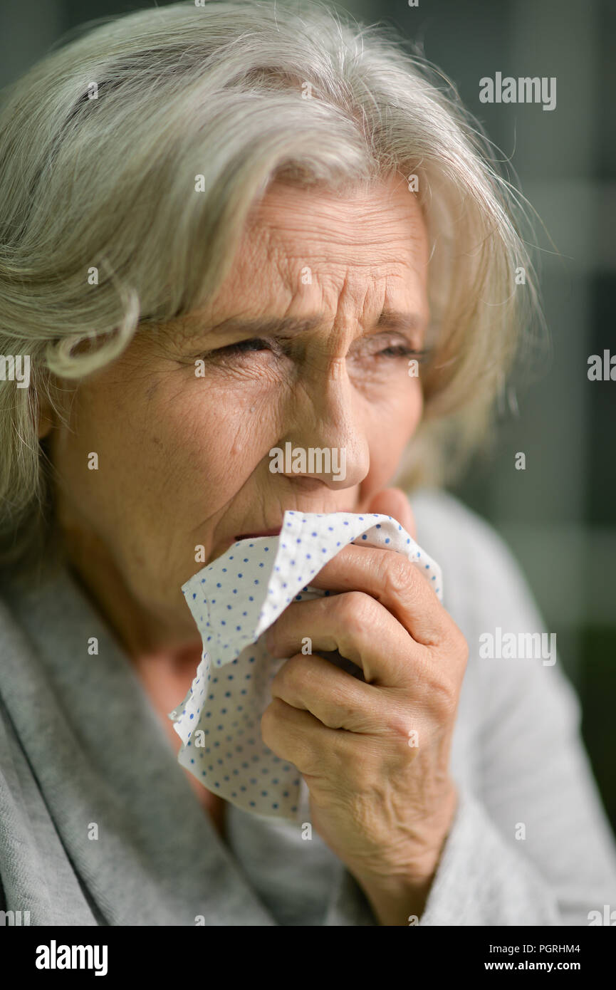 Close up portrait of a stressed senior woman Stock Photo - Alamy