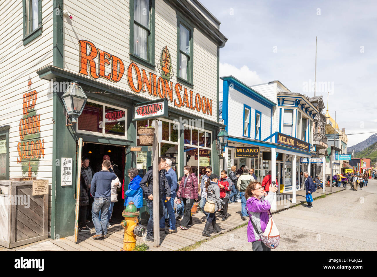 Tourists viewing the Red Onion Saloon, a historic brothel museum, in ...