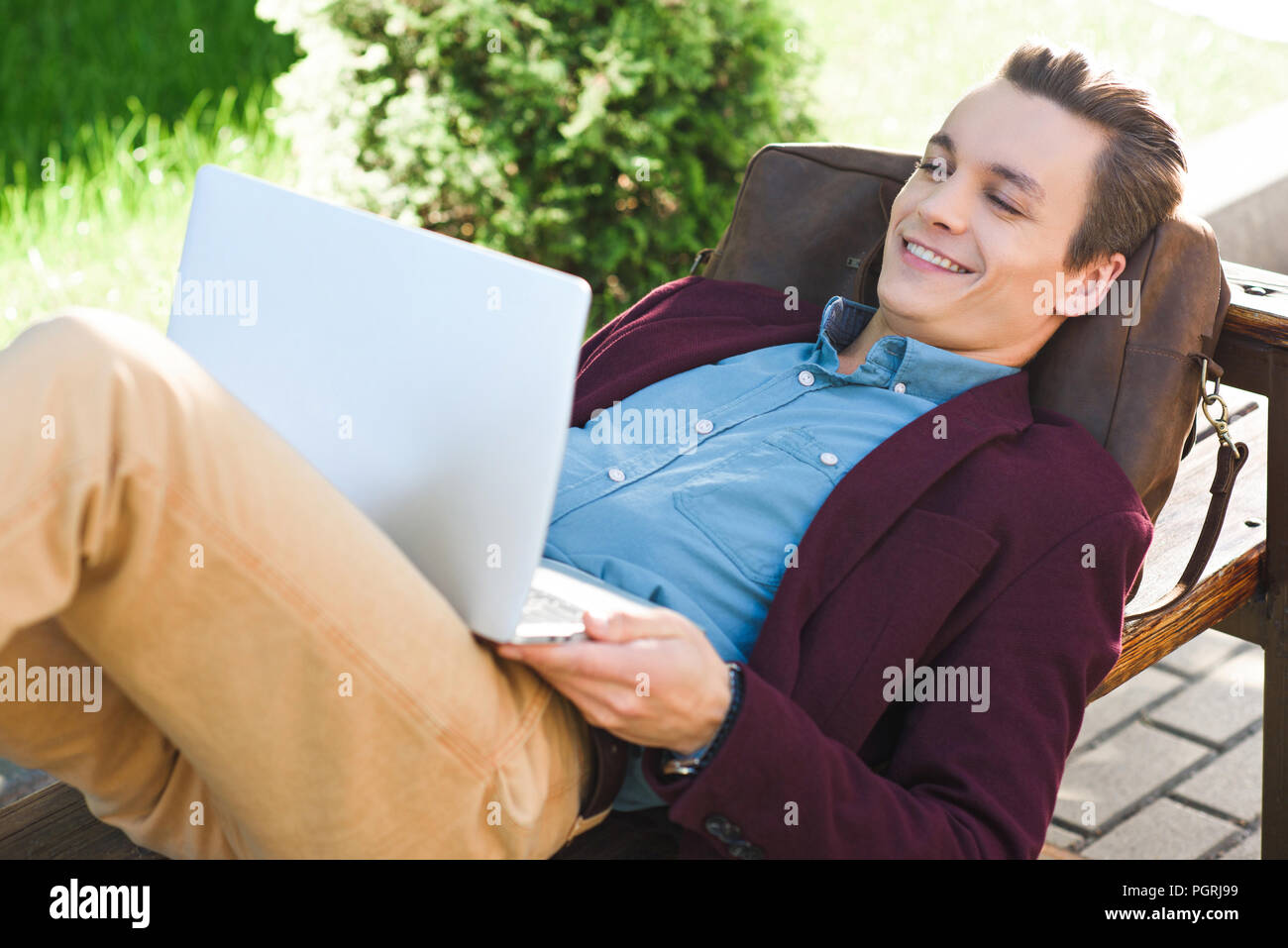 Young man lying on work bench hi-res stock photography and images - Alamy