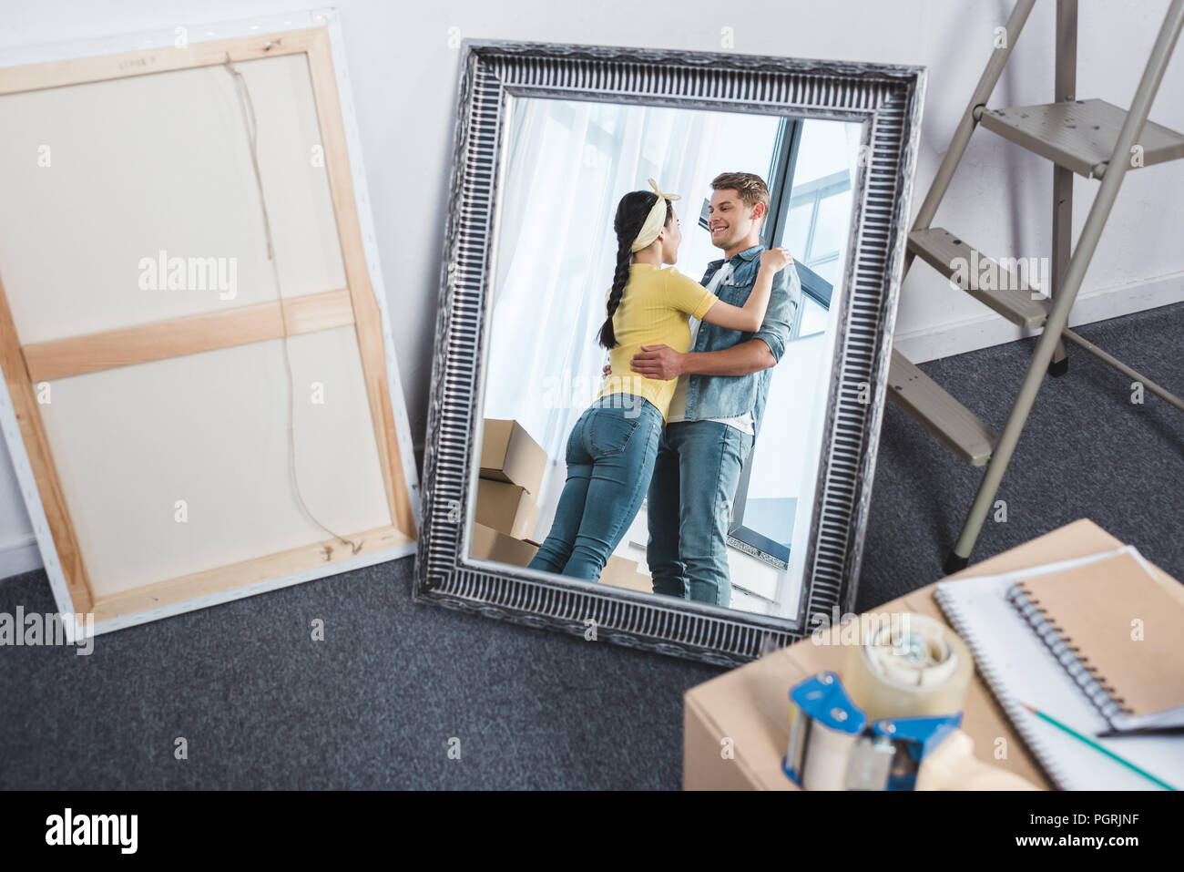 Couple hug mirror hi-res stock photography and images - Alamy