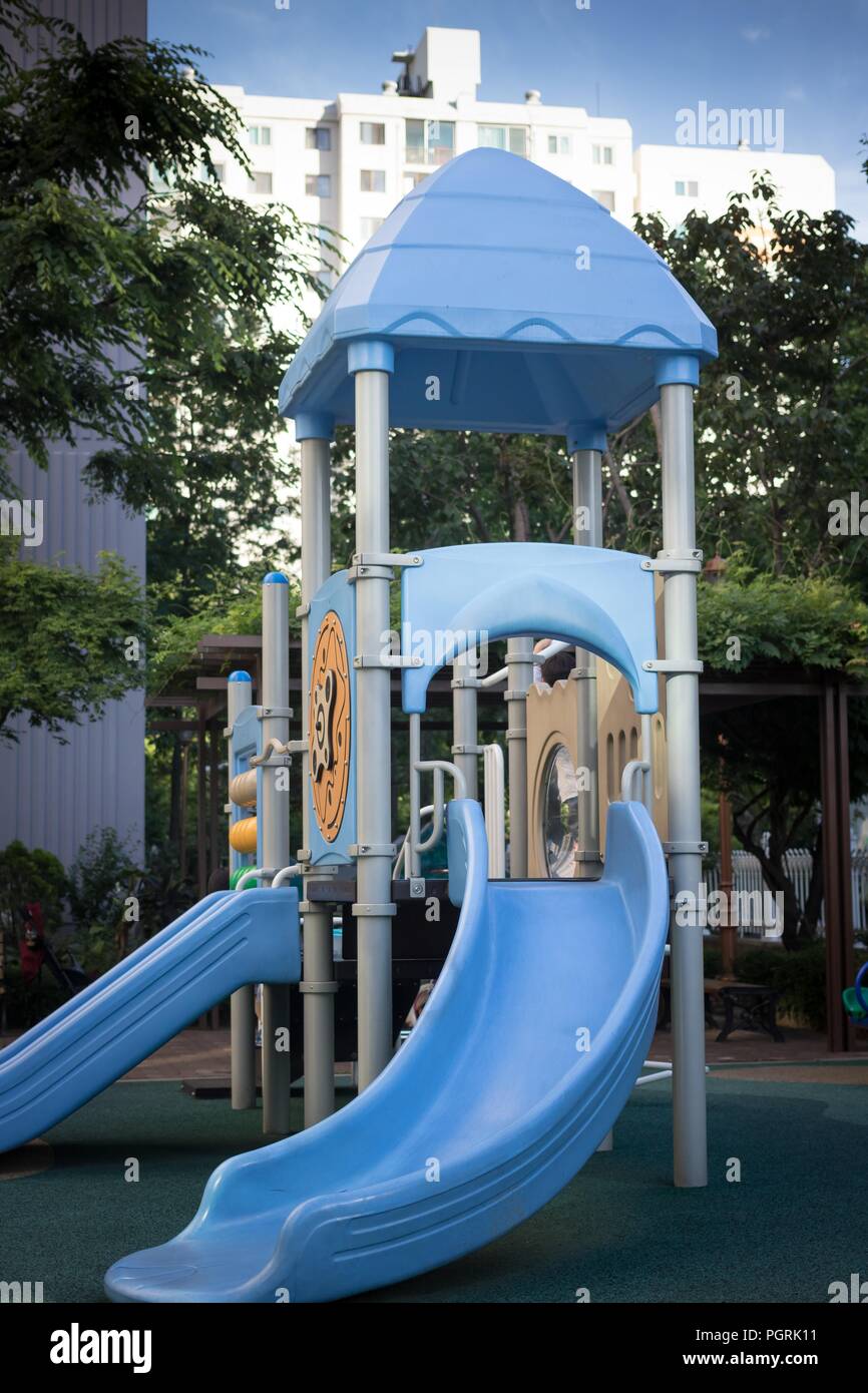 A playground slide in front of apartment, Korea Stock Photo - Alamy