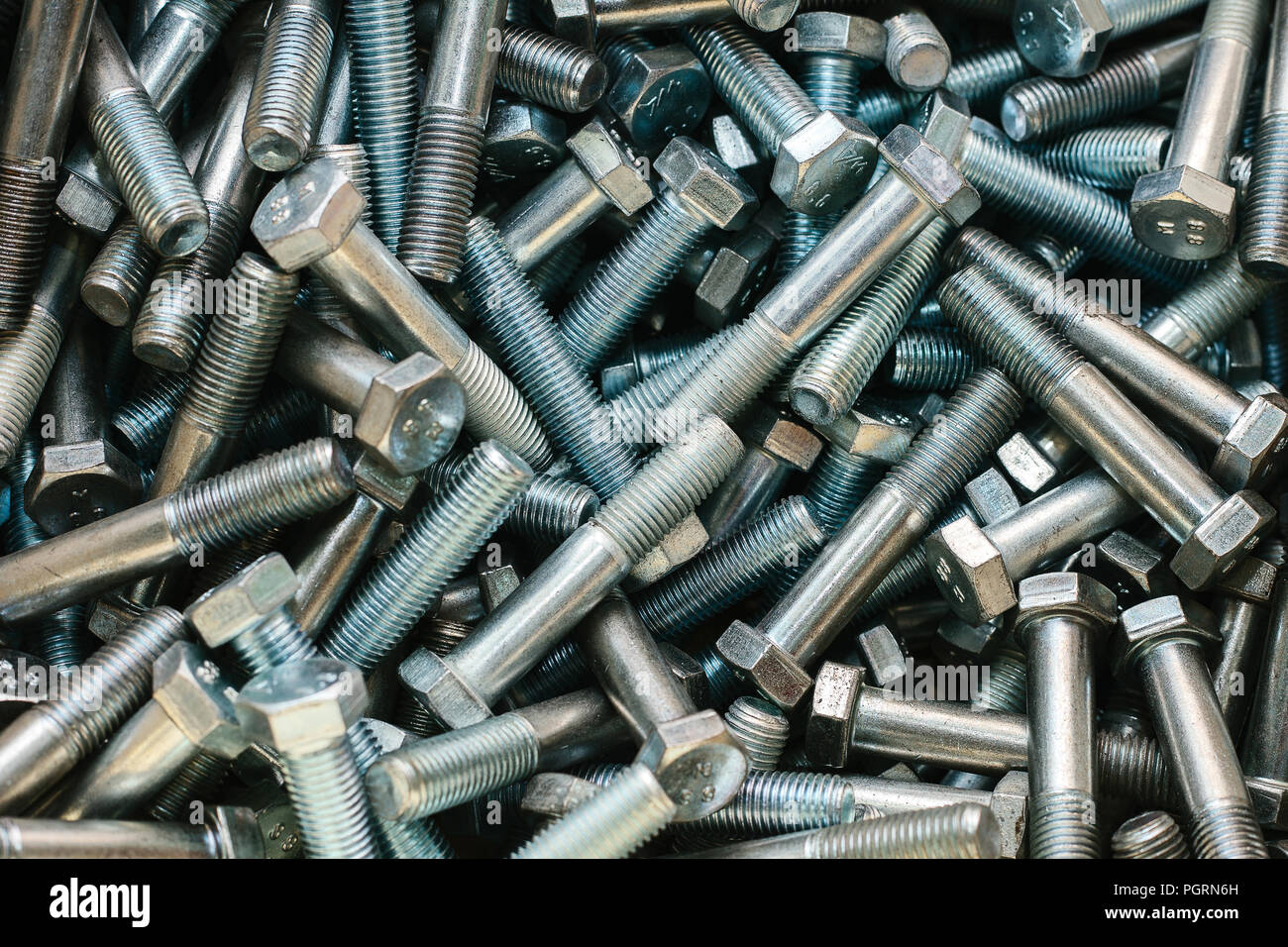 Close-up of a lot of bolts for fixing. Construction background Stock ...