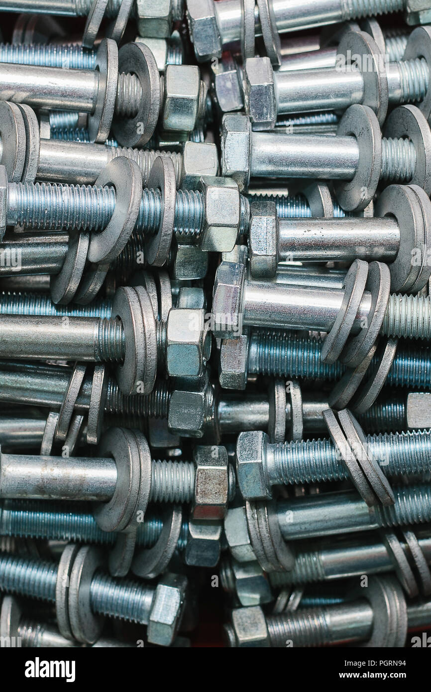 Close-up of a lot of bolts for fixing. Construction background Stock ...