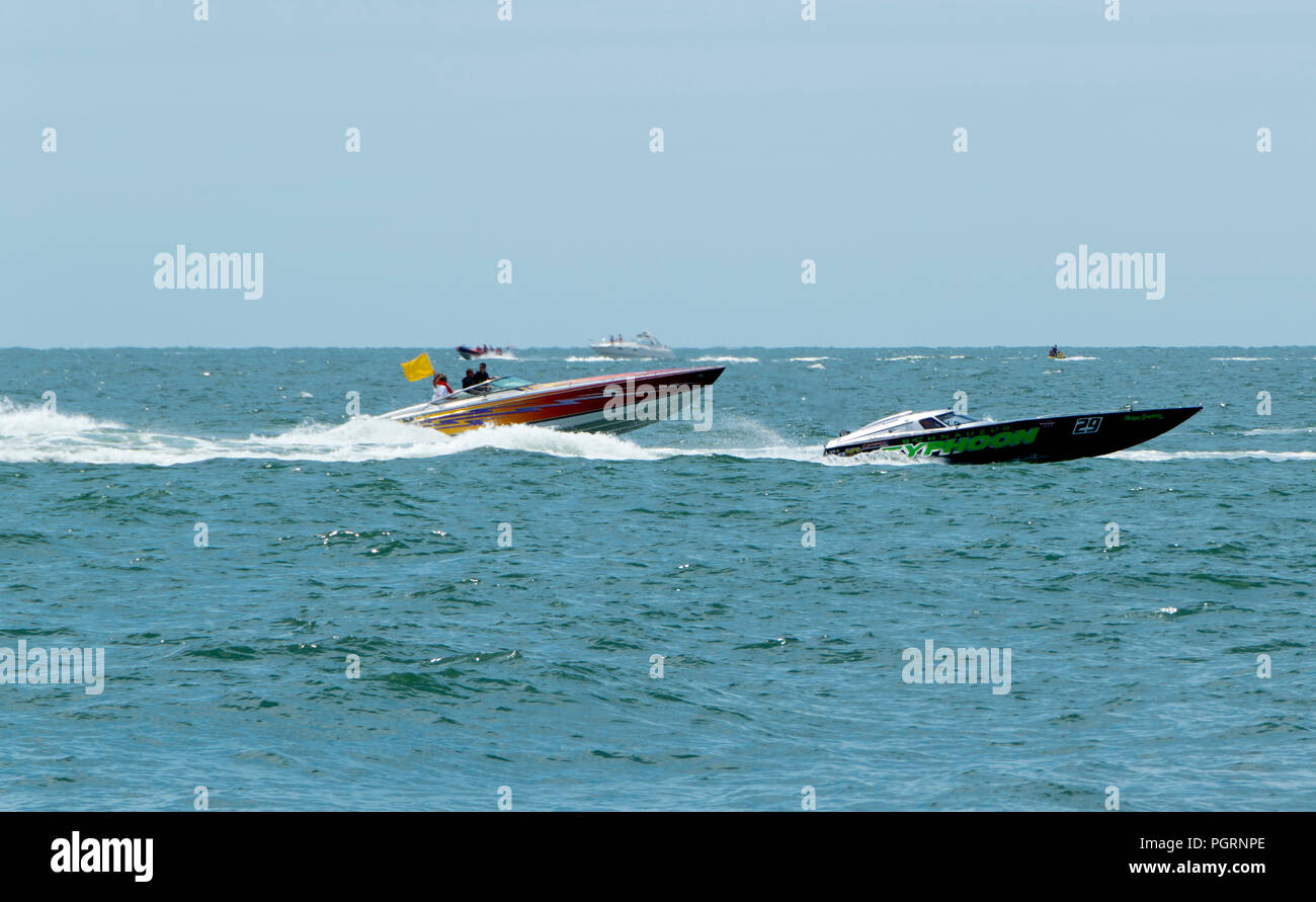 Two speed boats chasing each other Stock Photo - Alamy